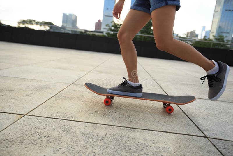 Skateboarder Skateboarding at City Stock Image - Image of skate, roof ...