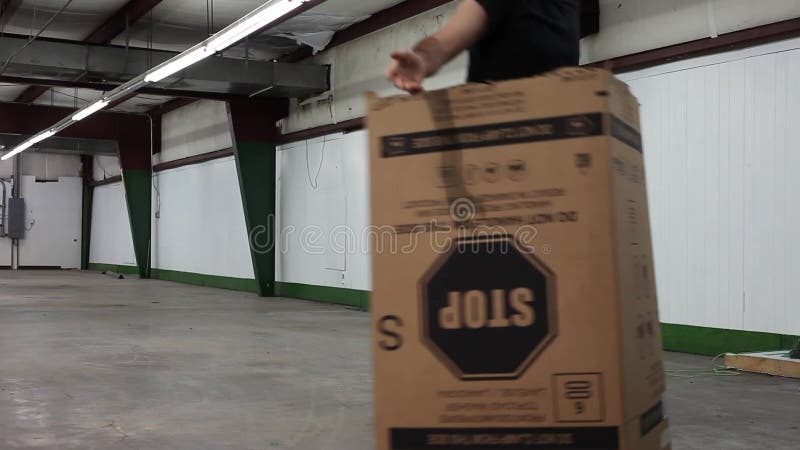 Skateboarder Stuck Inside Cardboard Box Rolls by Stock Video - Video of ...