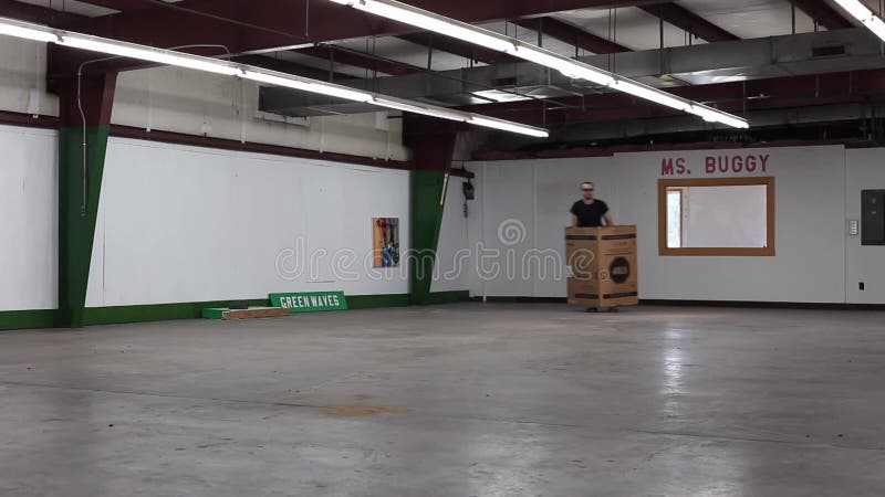 Skateboarding Around Inside of a Large Cardboard Box Stock Footage ...