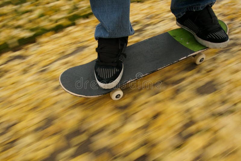 Skateboarding in fall stock photo. Image of sidewalk, yellow - 1625546