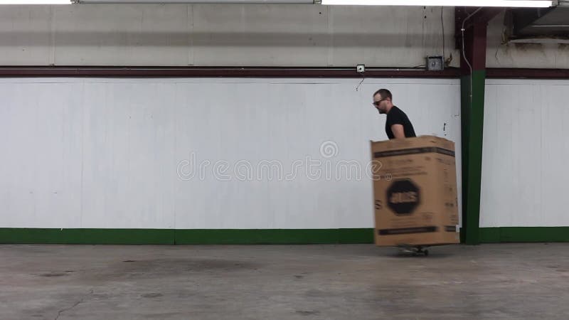 Skateboarding while Stuck in a Large Cardboard Box Stock Video - Video ...