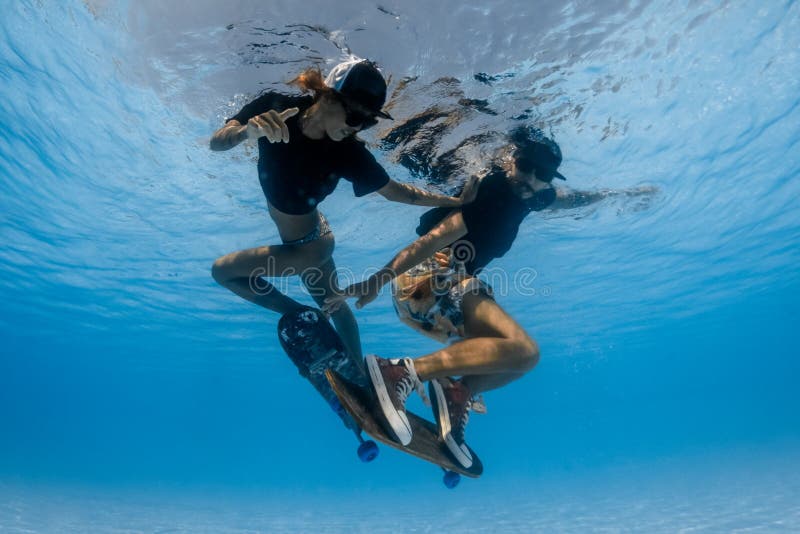 Skateboarding underwater stock image. Image of play, romantic - 76219961