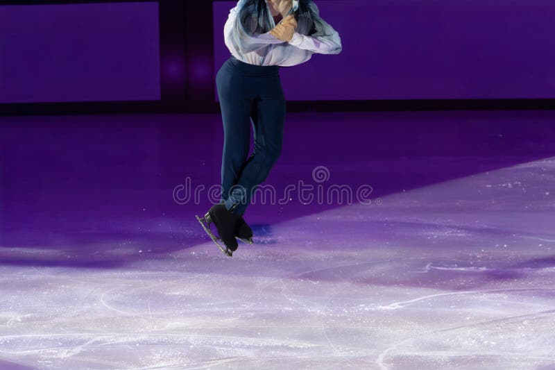 Skater Performing a Jump and Artistic and Technical Performance on the ...