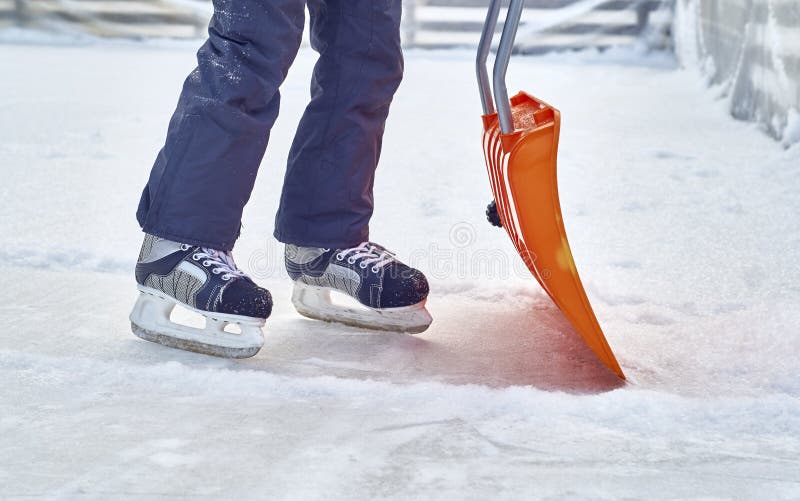 Skating Boy Cleaning a Rink Stock Image - Image of fence, legs: 65956897