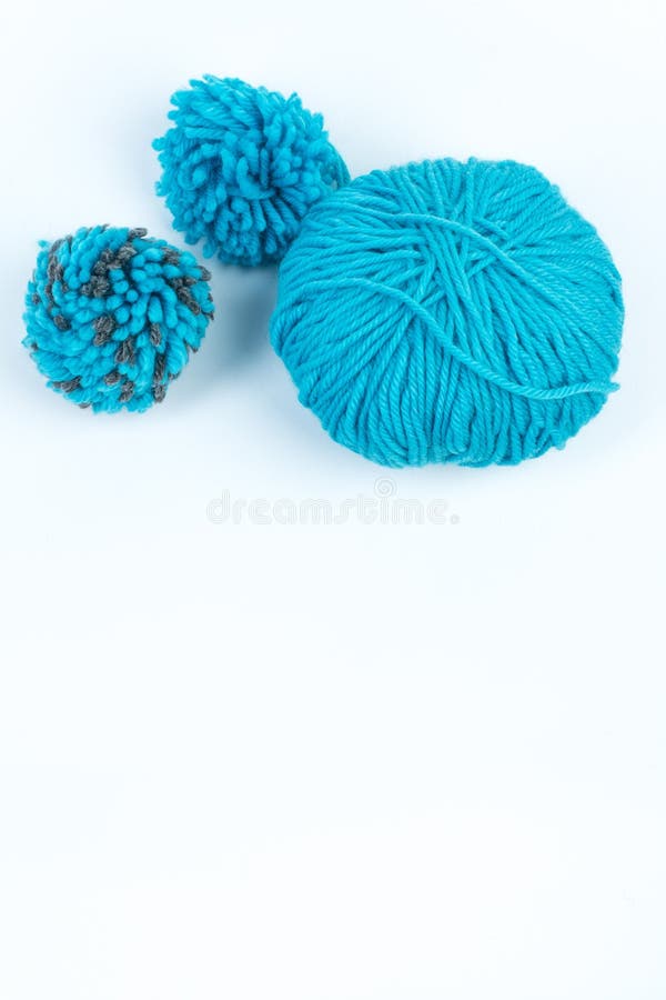 Skein of Blue Threads for Knitting on a White Background. Pompon Stock ...