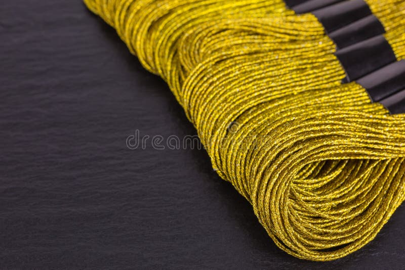 Golden embroidery thread stock photo. Image of embroidery - 169776908