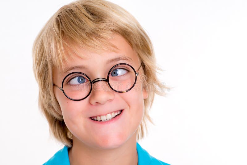 Korsögd blond pojke fotografering för bildbyråer. Bild av skratt - 64733027