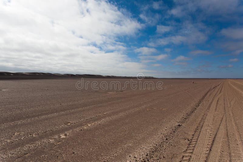 Skeleon coast road stock image. Image of clouds, naukluft - 51935115