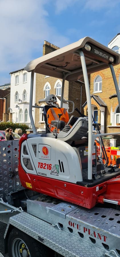 Skeleton Driving a Street Works Machine Editorial Photography - Image ...