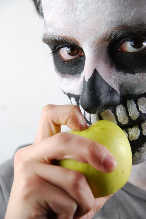 Skeleton guy with apple stock image. Image of horror - 13469663