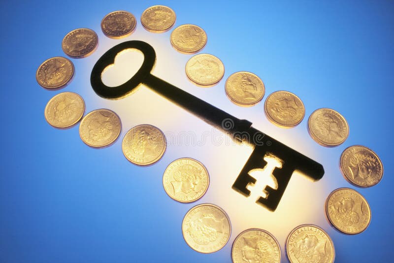 Skeleton Key and Gold Coins Stock Photo - Image of riches, money: 129769516
