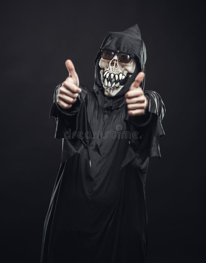 Skeleton In A Robe Showing Thumbs Up Stock Photos - Image: 34362513