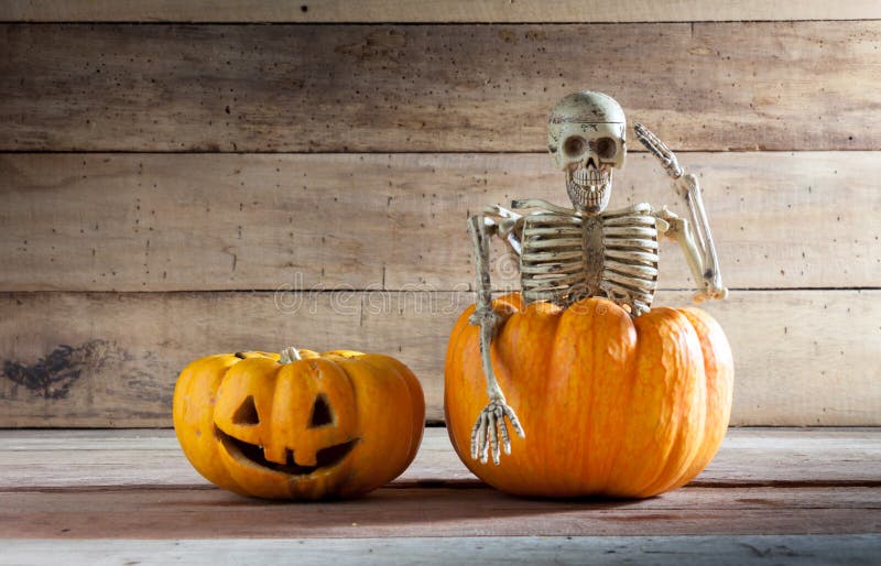 Skeleton Saluting Pumpkin Blur Background Stock Photos - Free & Royalty ...