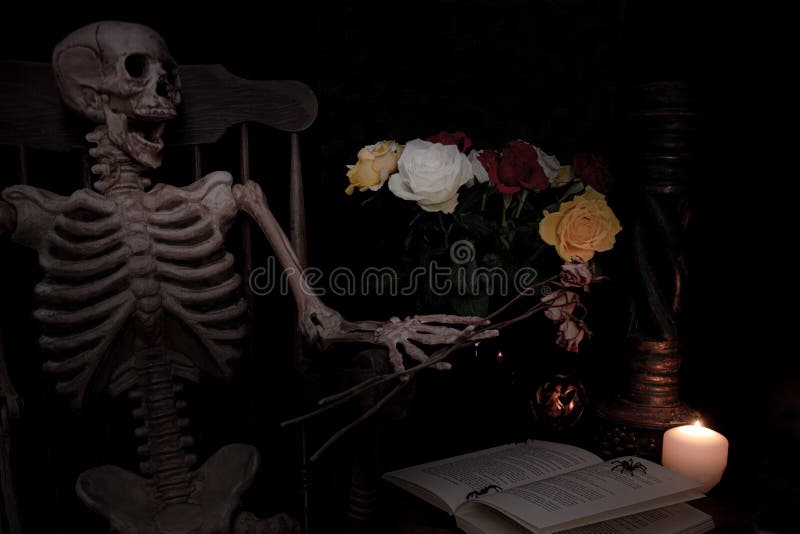 Skeleton Sitting at Desk Reading by Candlelight Stock Image - Image of ...