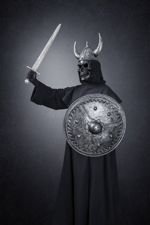Skeleton Warrior with Horned Helmet Sword and Round Shield Stock Image ...
