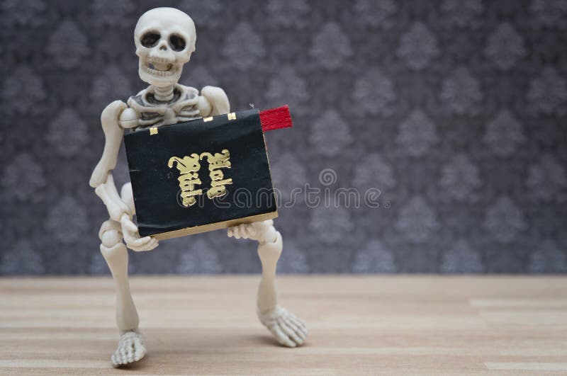 Skeletons and the Bible stock photo. Image of skull, catholic - 69250710
