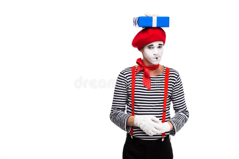 Skeptical Mime Standing with Gift Box on Head Stock Photo - Image of ...