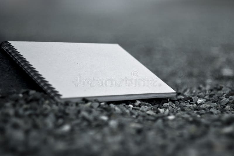 Sketchbook with a Hard Cardboard Cover on the Ground. Stock Image ...