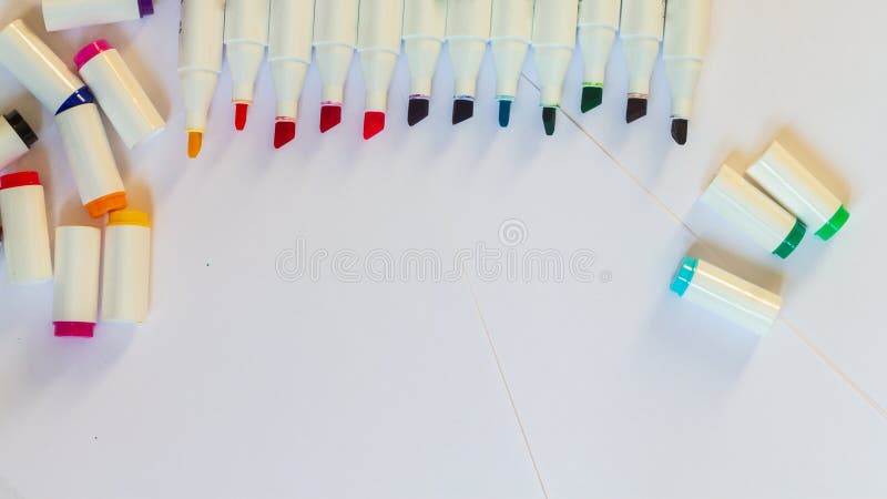 Sketching Markers with Open Caps on White Paper Stock Photo - Image of ...
