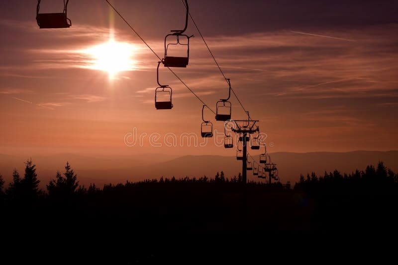 Ski Chair Lift in the Mountains at Red Sunset Stock Photo - Image of ...
