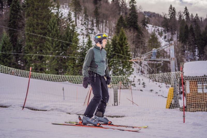 Ski Instructor at Training Track Showing Students How To Ski Stock ...