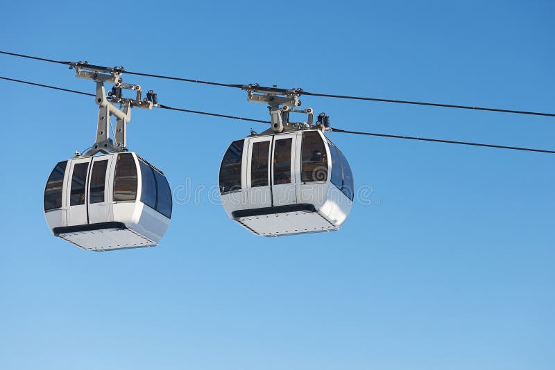 Ski lift cabins stock photo. Image of alpine, blue, activity - 265880440