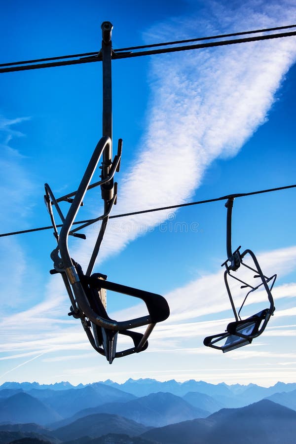 Ski lift chairs stock image. Image of slope, rope, alpine - 63593341