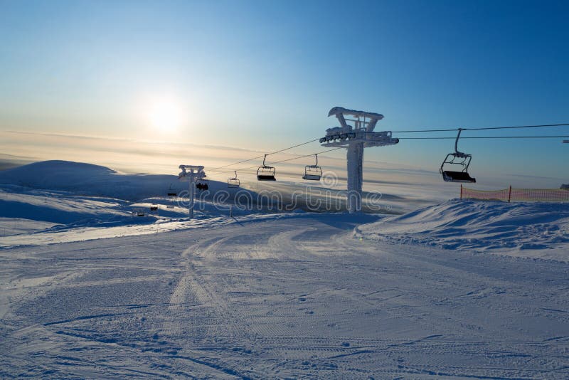 Ski Lift in the Rays of the Sun Stock Image - Image of blue, chair ...