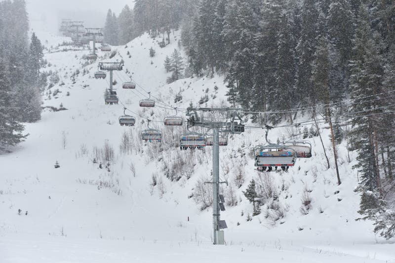 Ski Lift in the Snowfall in Mountains Stock Image - Image of mountain ...