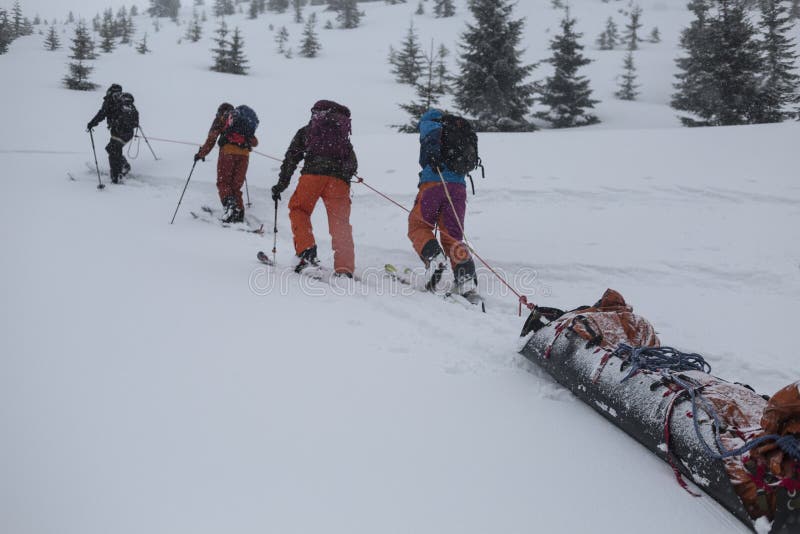 Ski Rescuers Pull a Special Sled Akya in the Mountains with the Victim ...