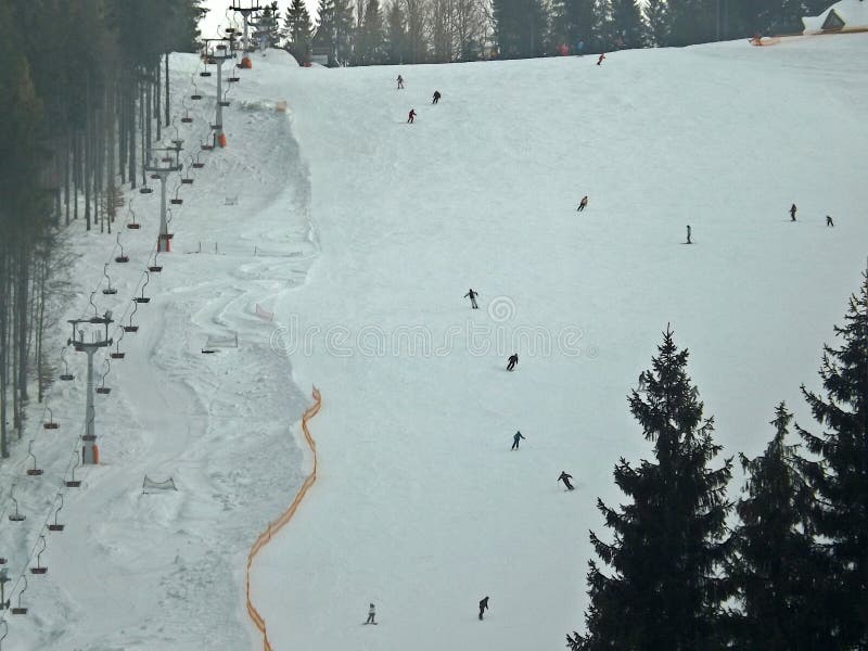 Aerial View Skiers Descending Snowy Mountain Slope Stock Photos - Free ...