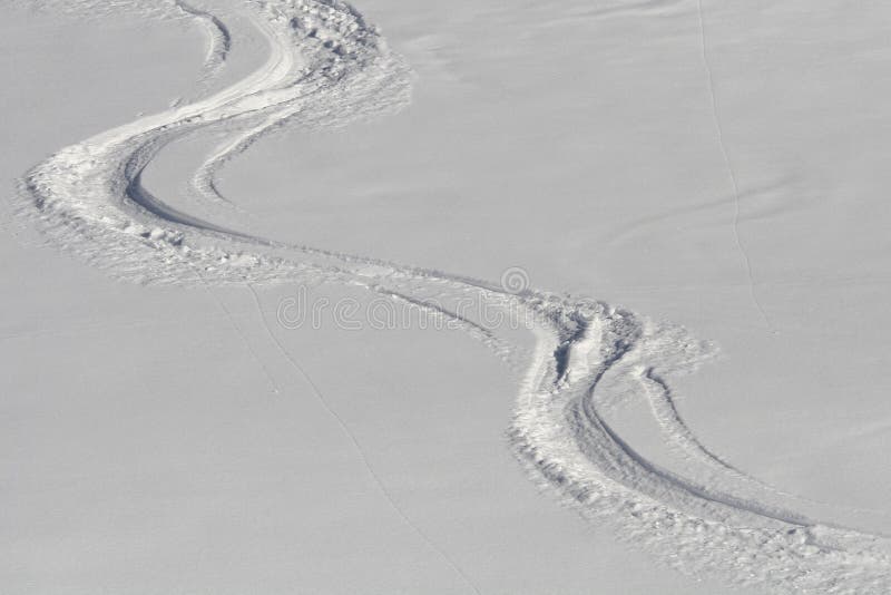Ski and snowboard tracks stock image. Image of route - 19246155