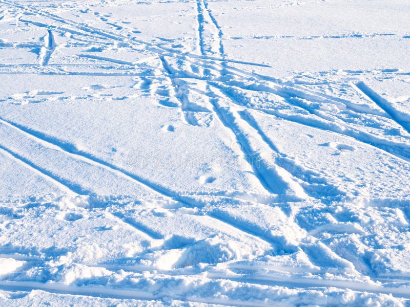 Ski Tracks in Snow Lit by Setting Sun in Twilight Stock Image - Image ...