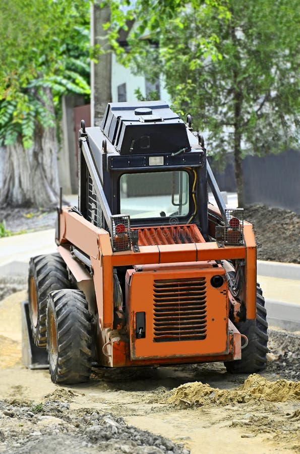 Skid steer loader machine stock image. Image of steer - 316552349