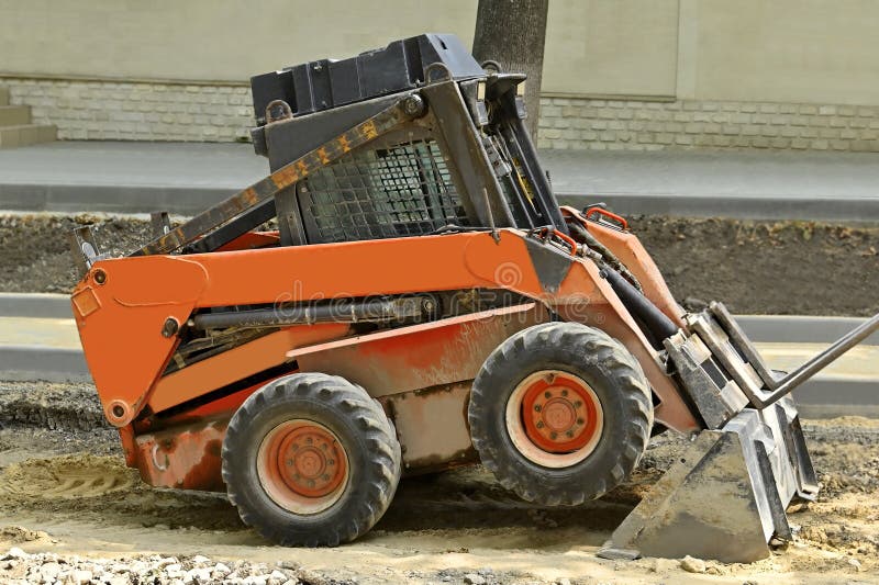 Skid steer loader machine stock photo. Image of little - 316437822