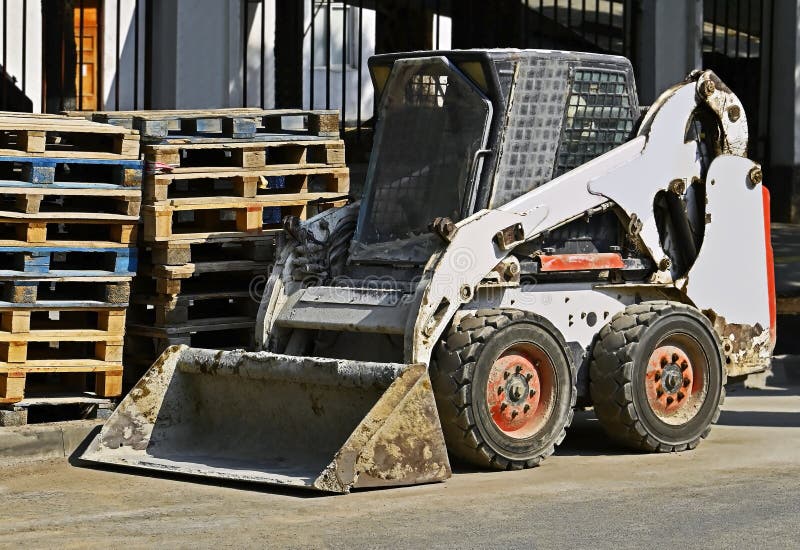 Skid steer loader machine stock photo. Image of vehicle - 317263646
