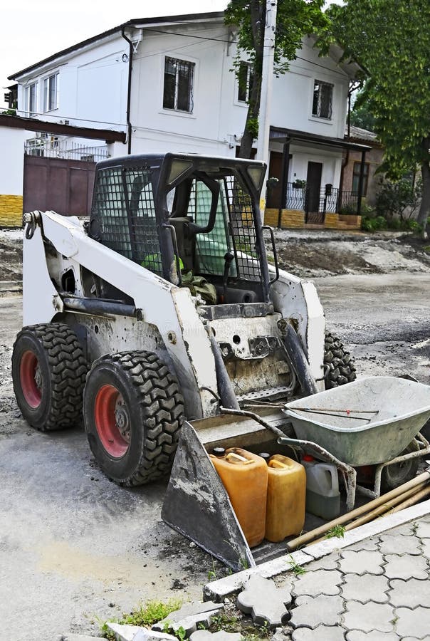 Skid steer loader machine stock photo. Image of mover - 317565174