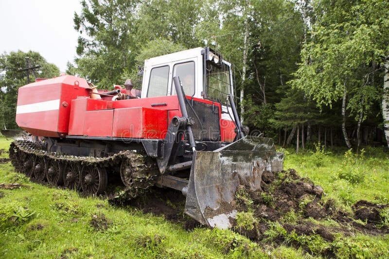 Skidding Tractor in the Work Process Editorial Photography - Image of ...