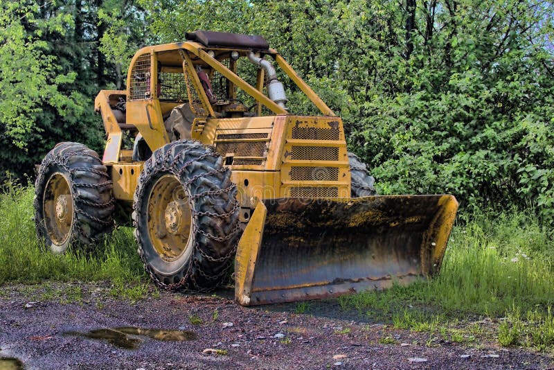 Skidder with a Snow Plow stock photo. Image of transportation - 33099224