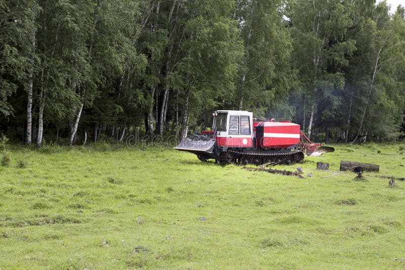 Skidding Tractor in the Work Process Stock Photo - Image of digging ...