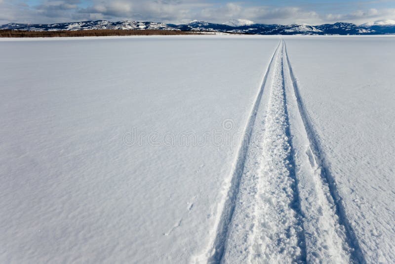 Skidoo Track on Frozen Lake Stock Image - Image of frozen, freeride ...