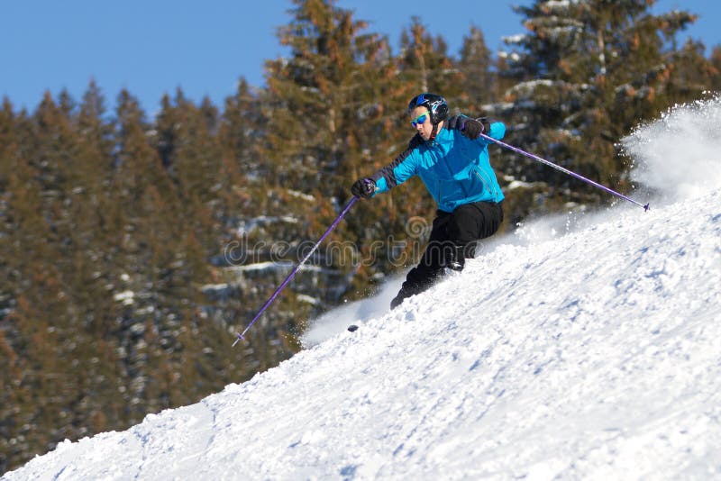 Skier Carving in Deep Powder Snow Stock Photo - Image of mountains ...