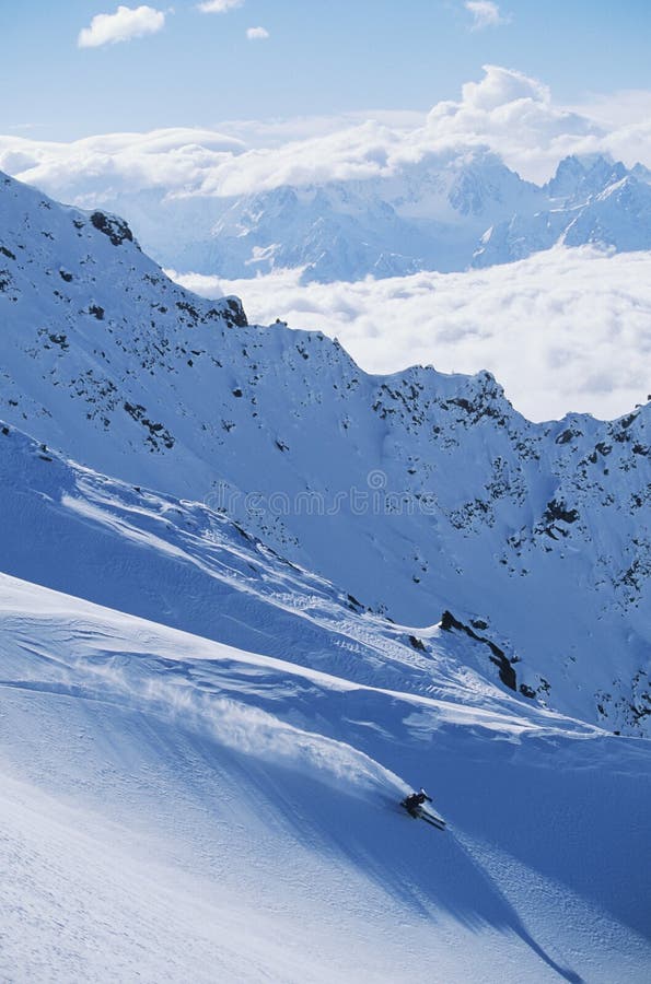 Skier Moving Down Slope stock photo. Image of angle, recreation - 31837336