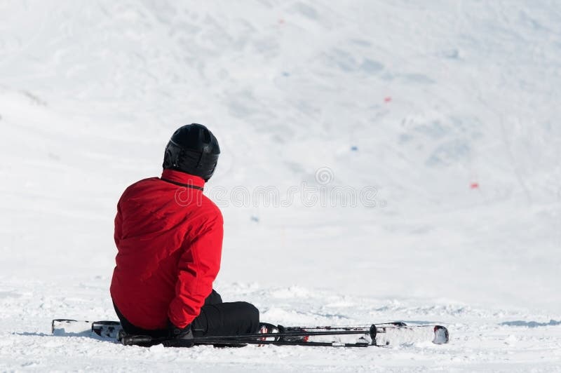 Skier sitting on ski slope stock image. Image of height - 38127725