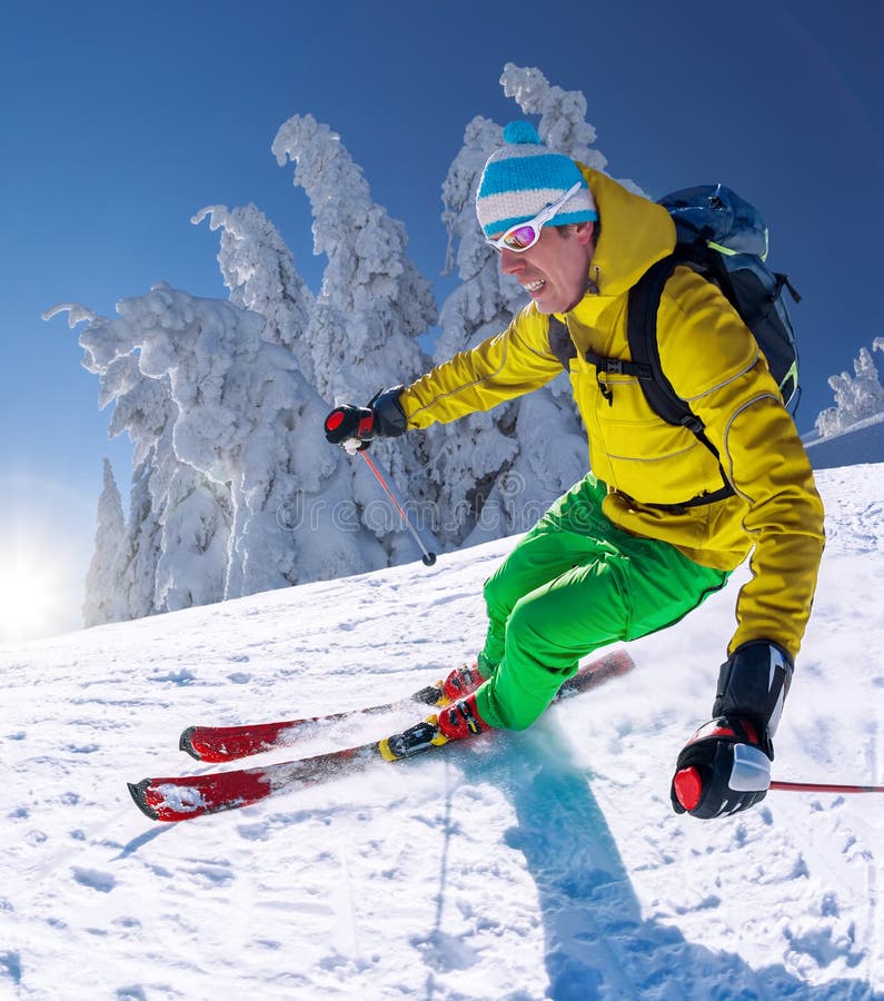 Skier Skiing Downhill In High Mountains Against Cable Lift Stock Image ...