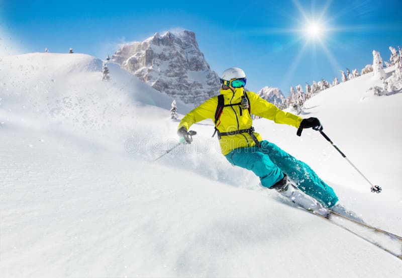 Skier Skiing Downhill in High Mountains Stock Photo - Image of mountain ...