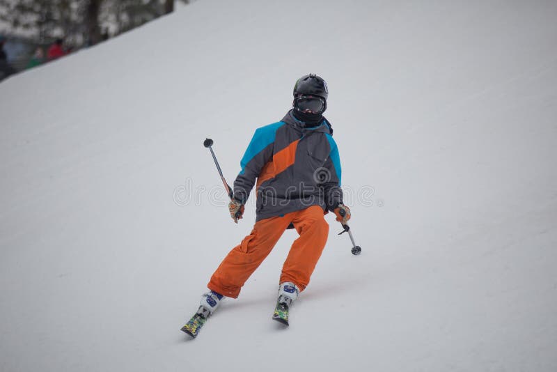 Skier Sliding Down Steep Slope Overlooking the Snowbird Glacier in the ...