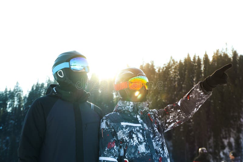 Skiers in Goggles and Ski Helmets Outdoor Stock Photo - Image of ...