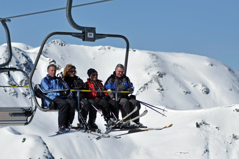 Skiers Going Up with Ski Lift Editorial Photography - Image of alps ...