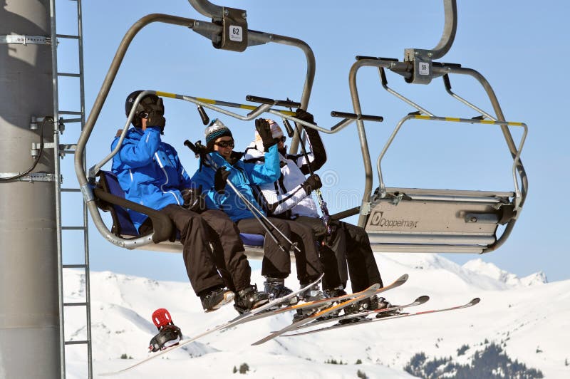Skiers Going Up with a Ski Lift Editorial Stock Image - Image of ...